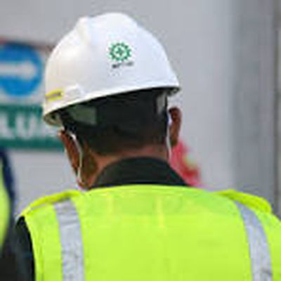 Why do construction workers wear a safety vest?